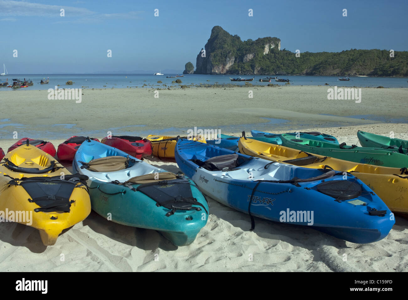 Kayak boats on the beach on Phi Phi Island in Thailand Stock Photo - Alamy