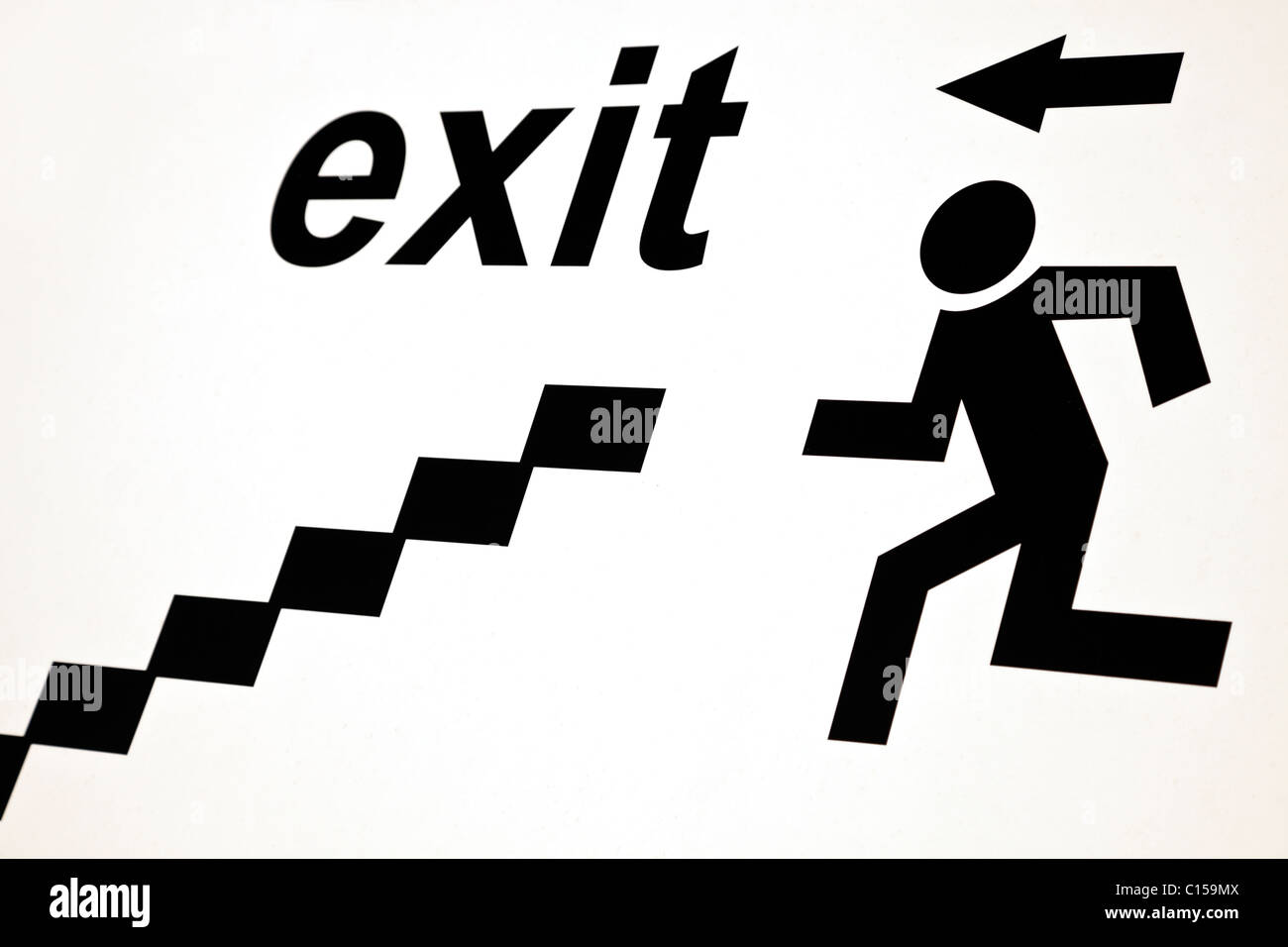 Exit sign in industrial area Stock Photo - Alamy