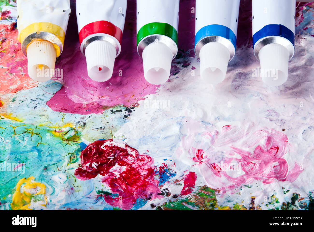 colorful color mixing palette of different color tubes Stock Photo - Alamy