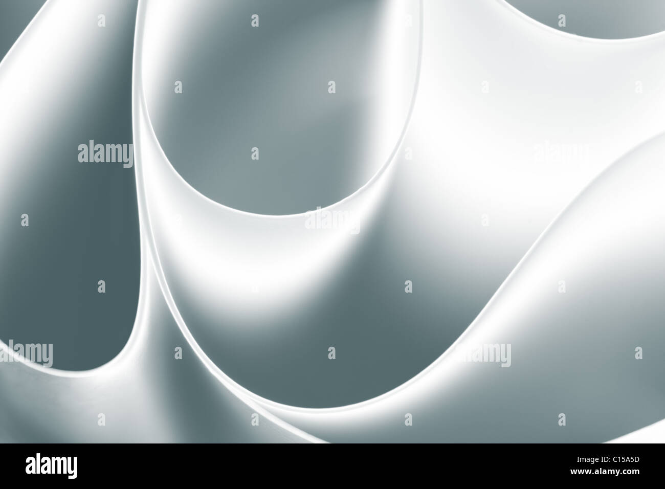 a macro, abstract, background picture of white sheets of paper, wavy ...