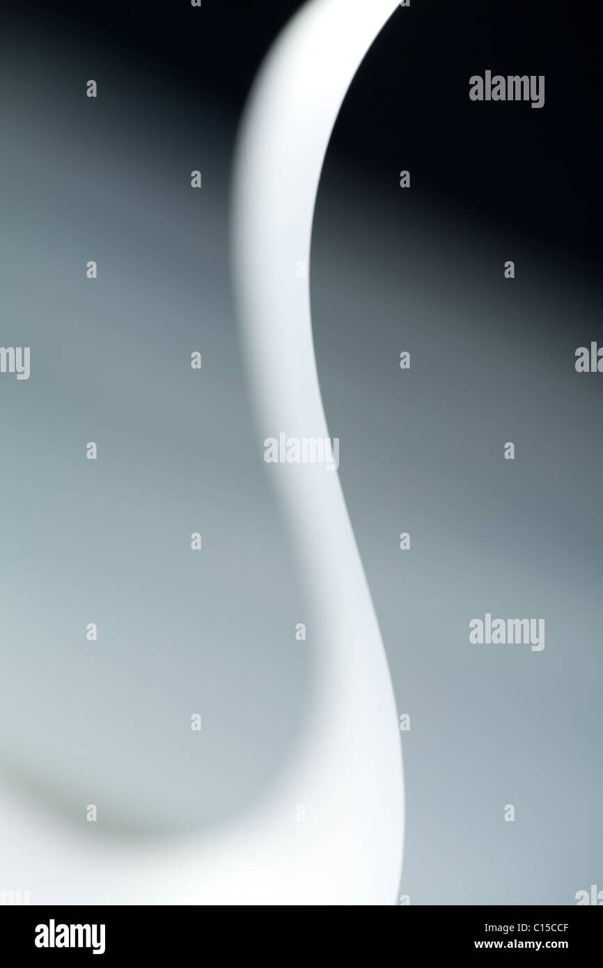 a macro, abstract, background picture of a white sheet of paper, in a ...