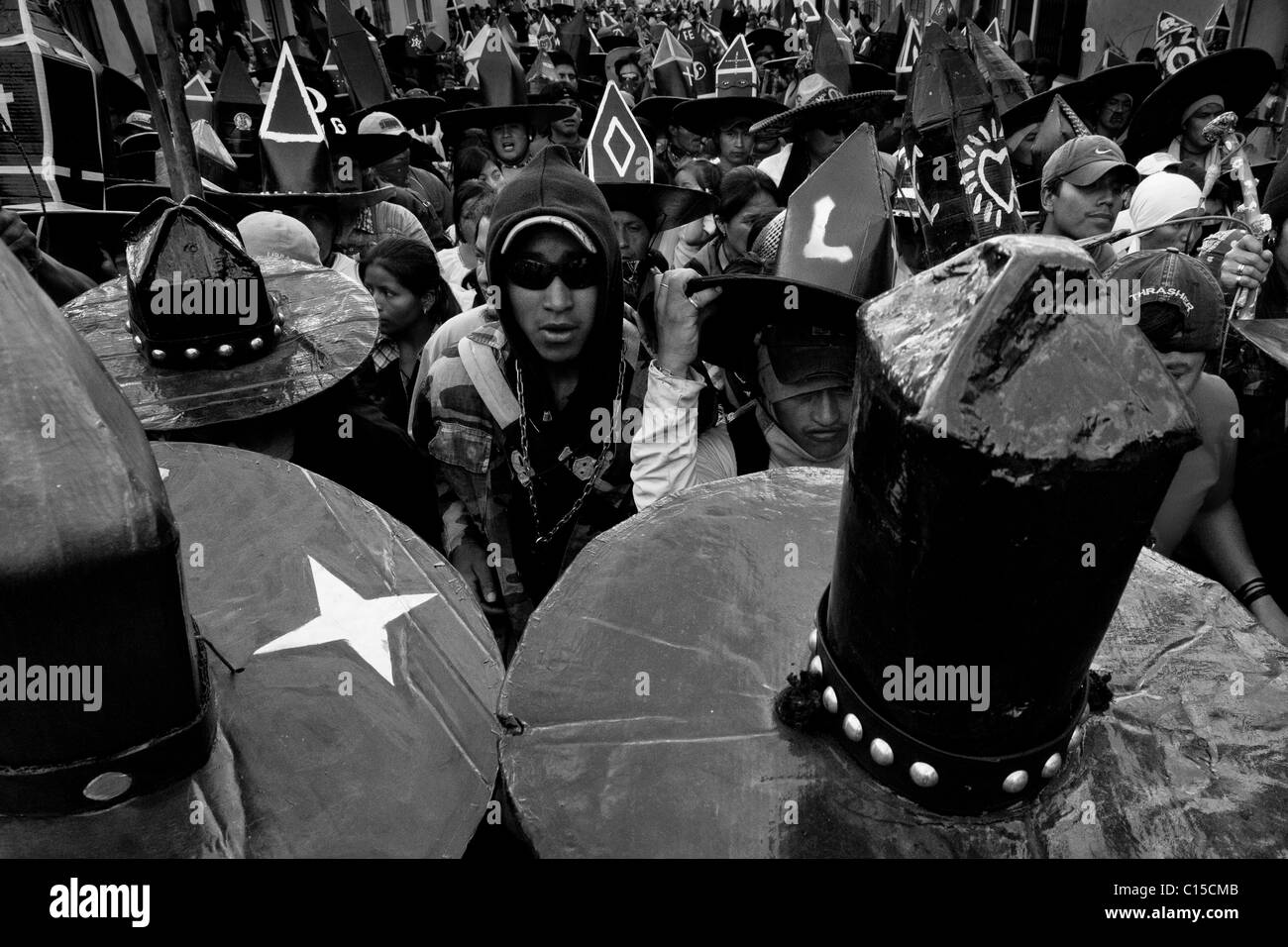 Indians, wearing black cardboard hats, dance during the Inti Raymi (San ...