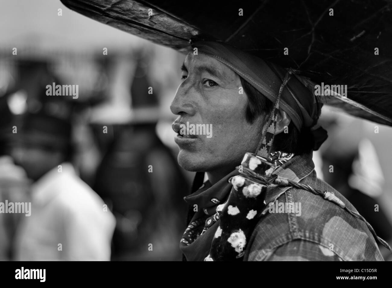 An Indian, wearing a large cardboard hat, performs during the Inti ...