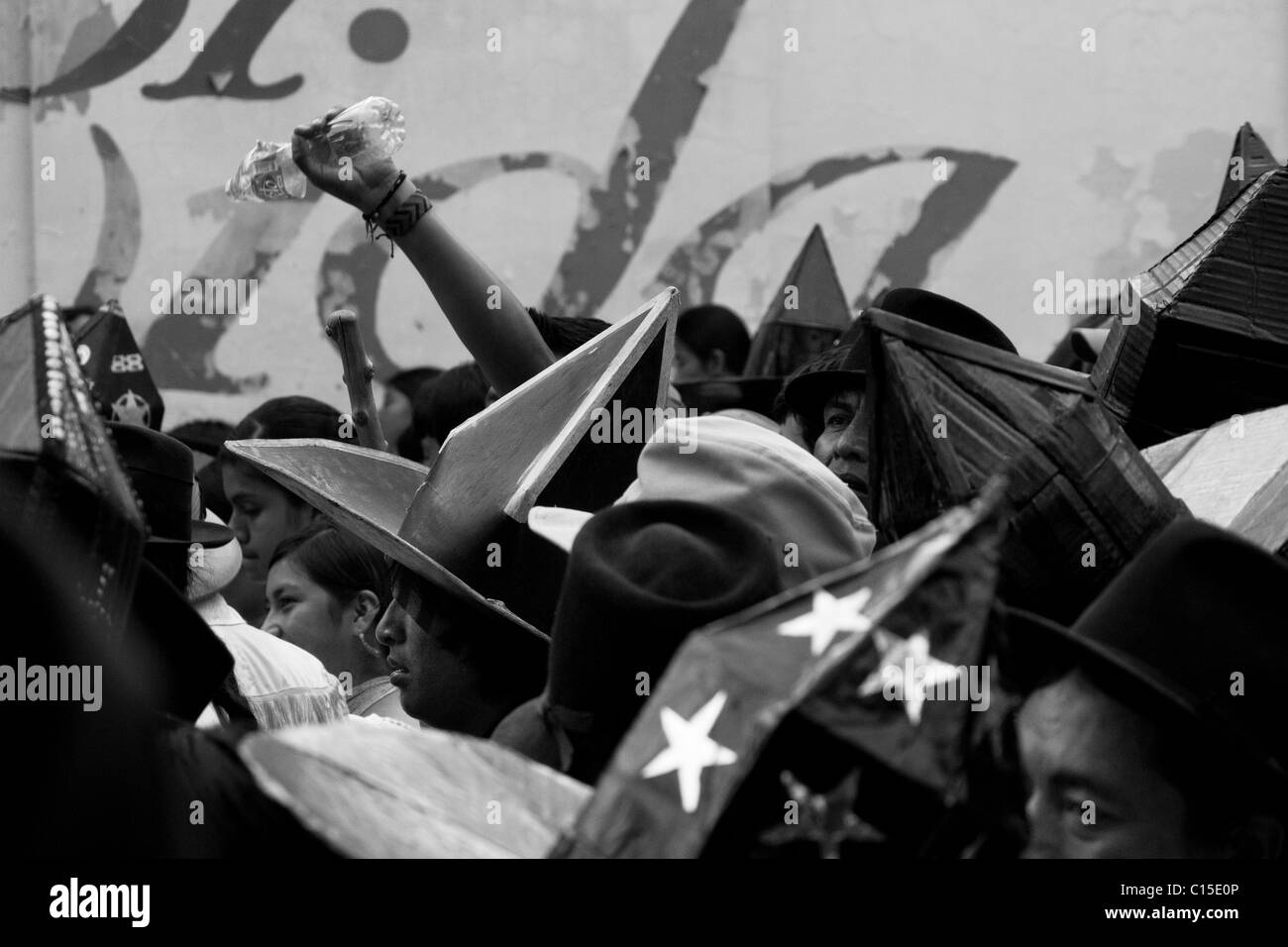 Indians, wearing black cardboard hats, danc furiously during the Inti ...