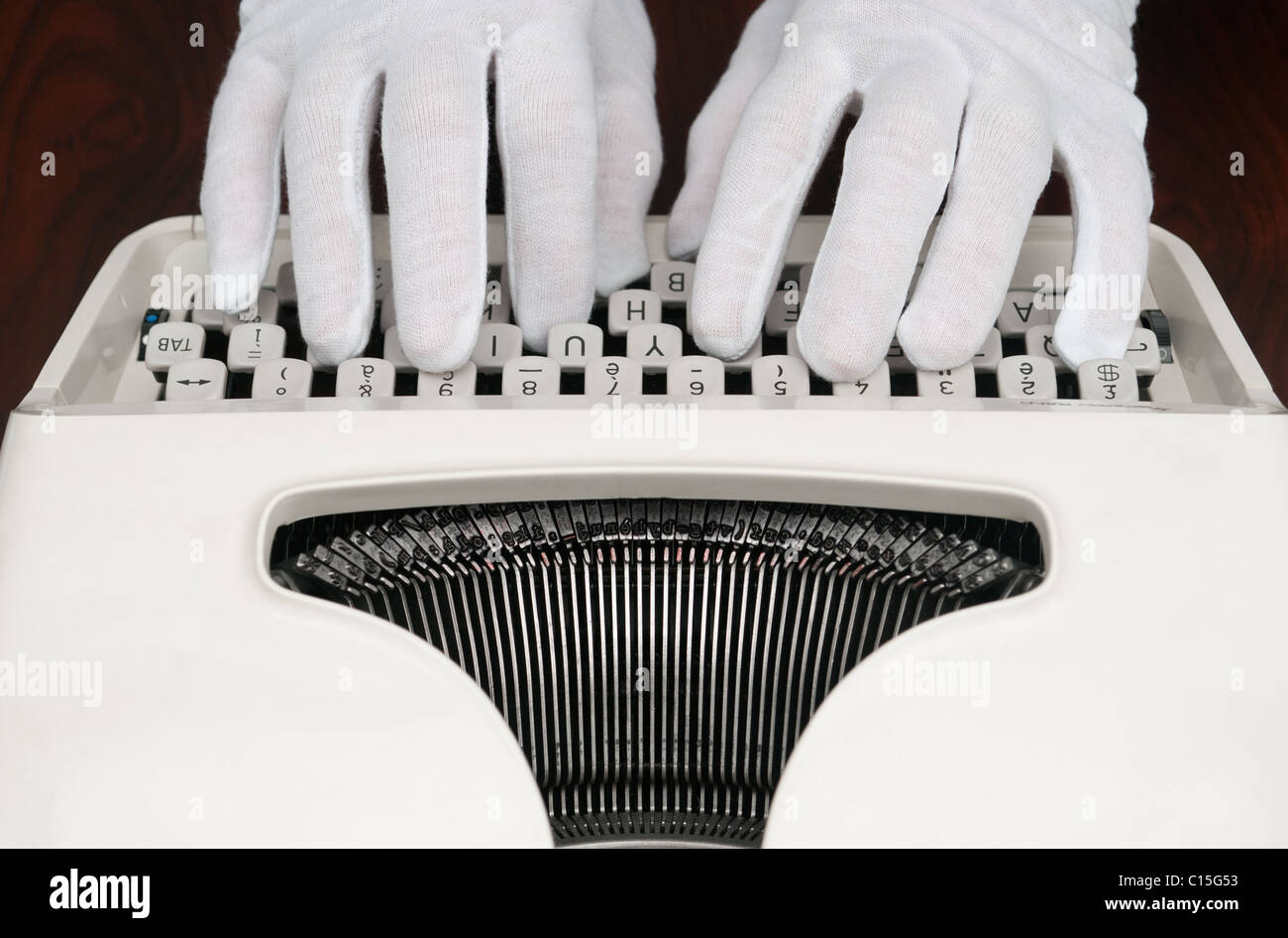 typewriting with white gloves Stock Photo - Alamy