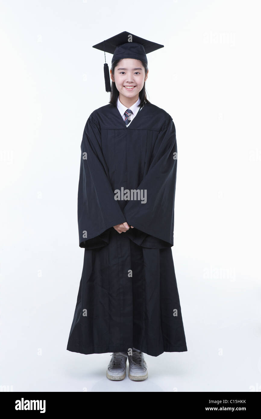 girl in graduation gown Stock Photo - Alamy