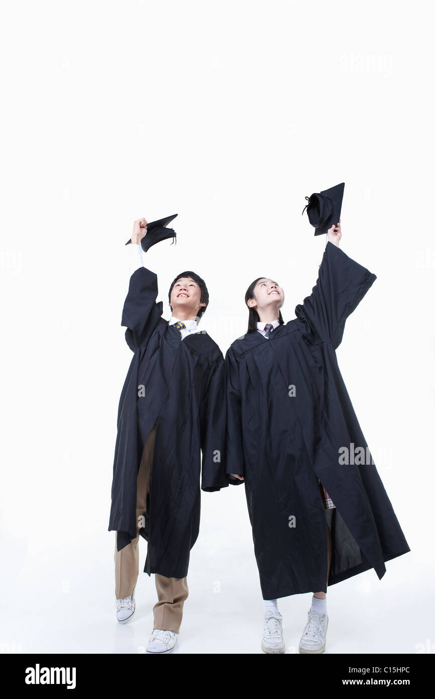 teenagers celebrating graduation Stock Photo - Alamy