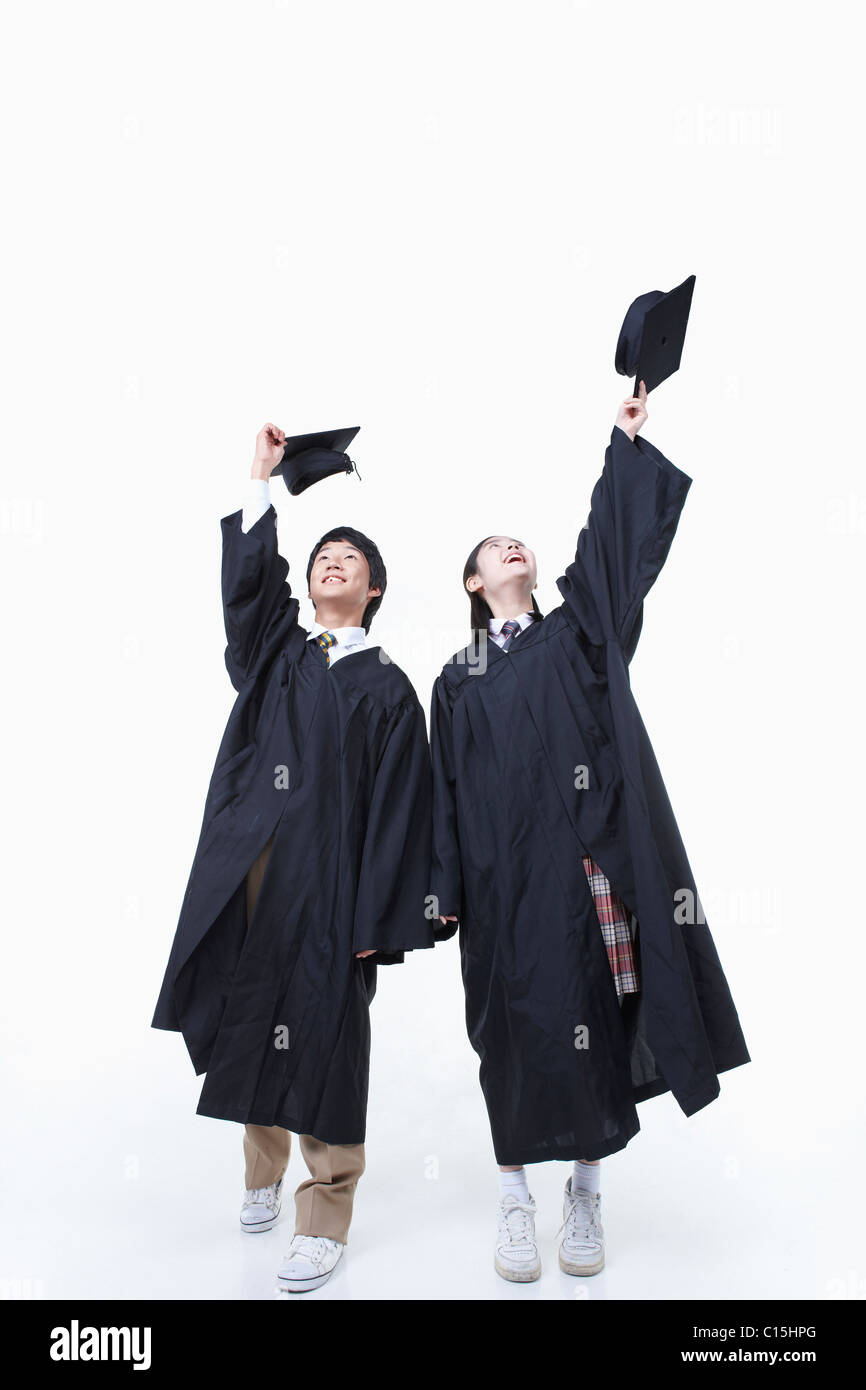 teenagers celebrating graduation Stock Photo - Alamy