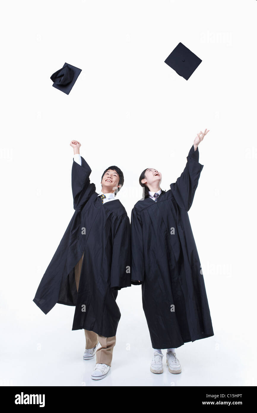 teenagers celebrating graduation Stock Photo - Alamy