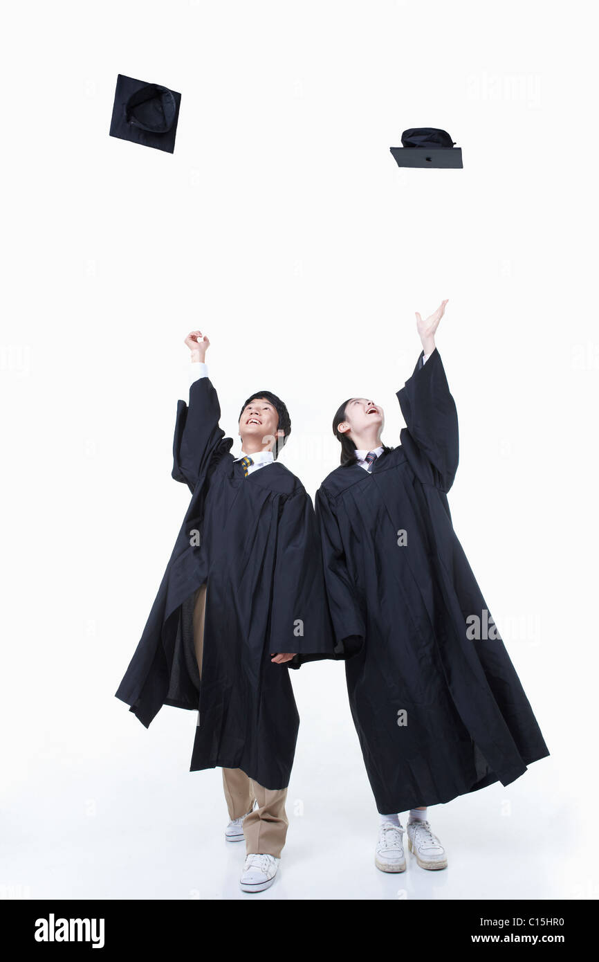 teenagers celebrating graduation Stock Photo - Alamy