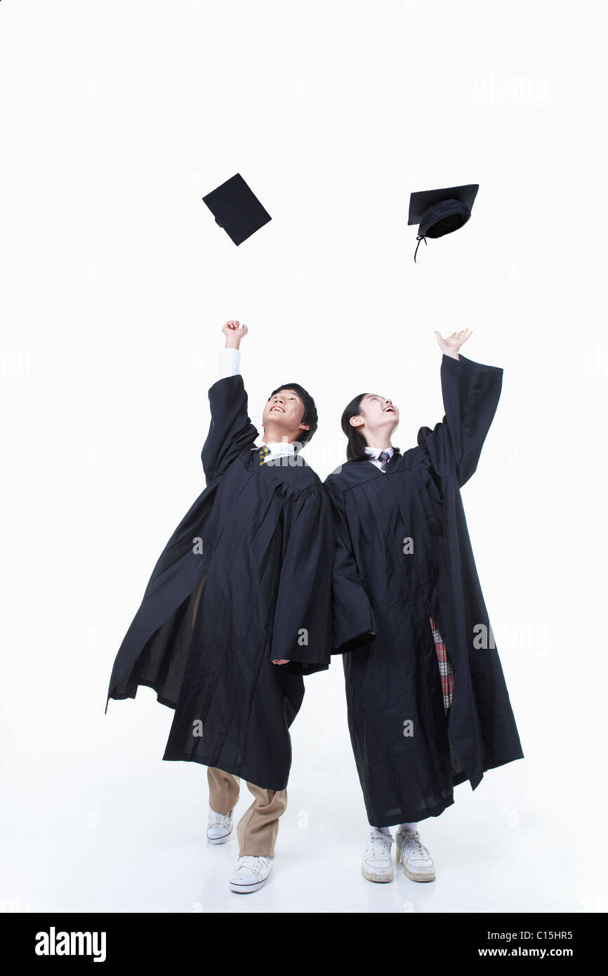 teenagers celebrating graduation Stock Photo - Alamy