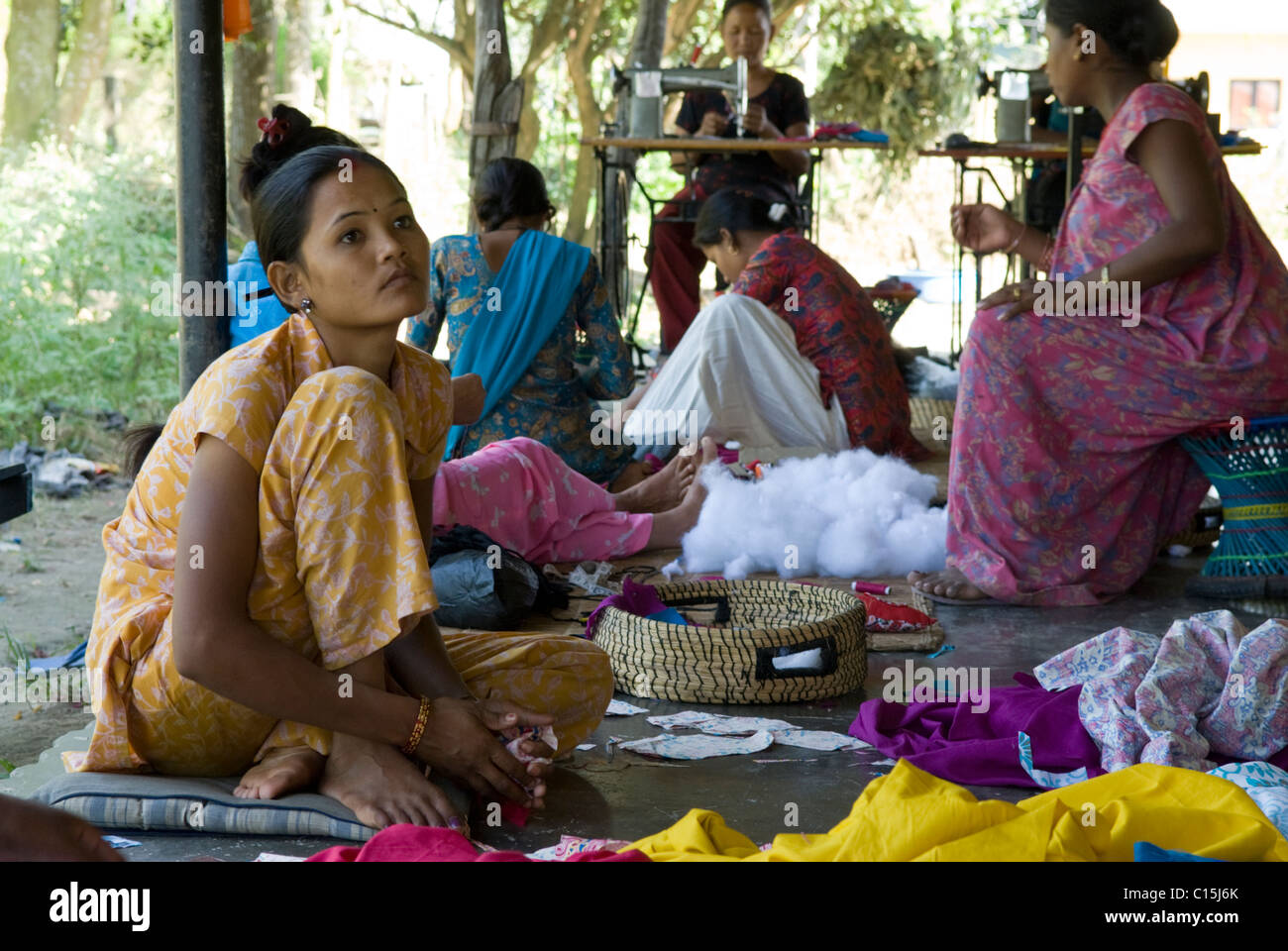 Women work in a development project, designed to alleviate poverty for ...