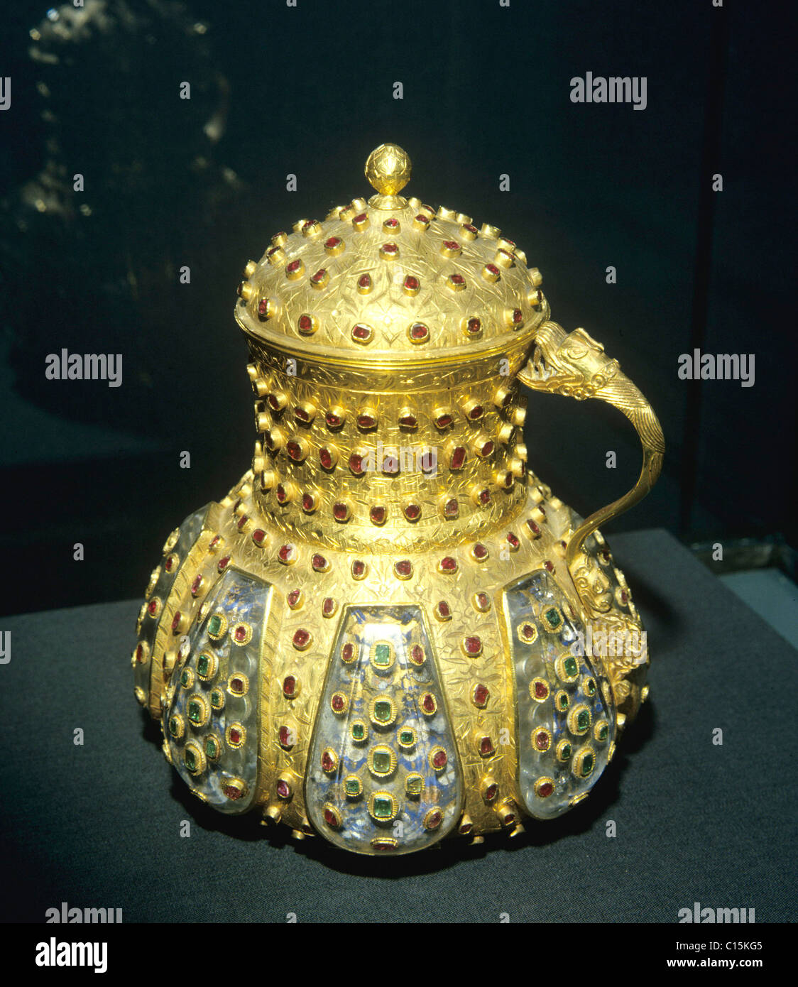 Gold jug . with dragon handle , decorated with emeralds and rubies ...
