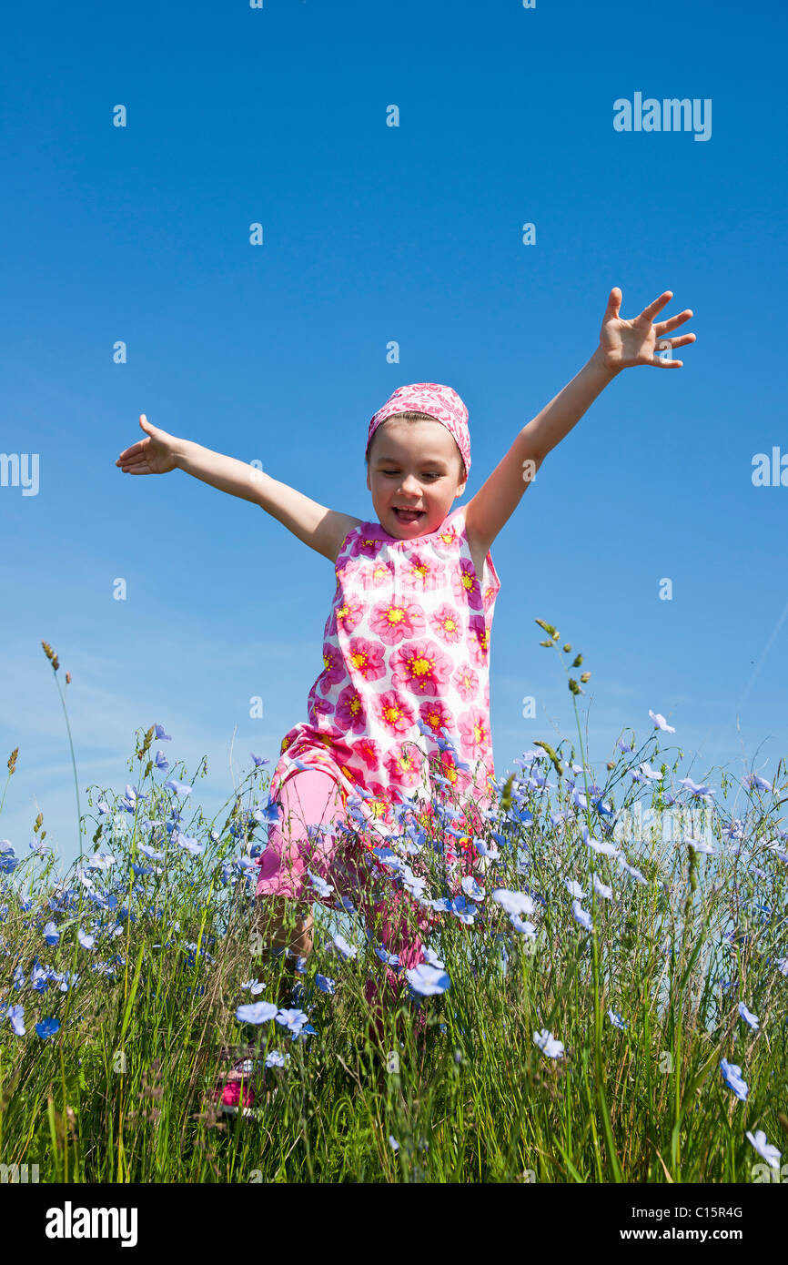 Girl run flower hi-res stock photography and images - Alamy