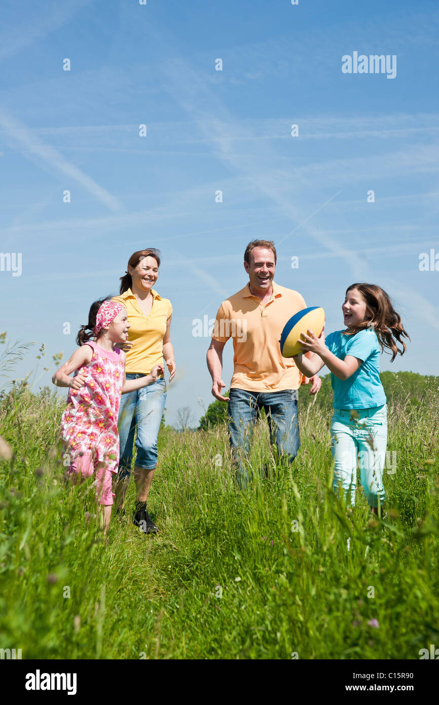 Football throwing adults hi-res stock photography and images - Alamy