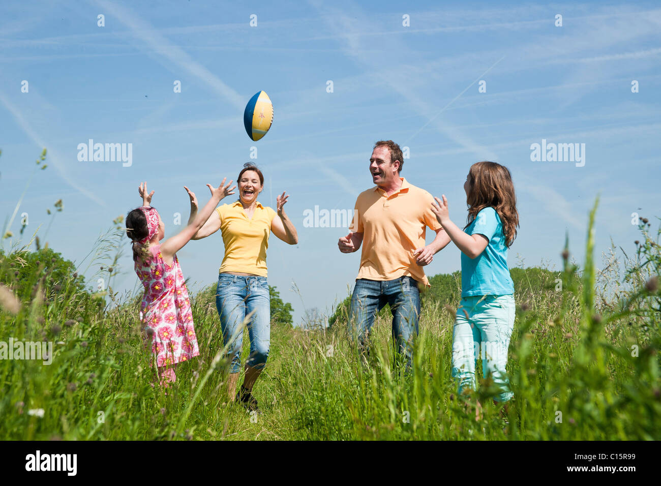 Football throwing adults hi-res stock photography and images - Alamy