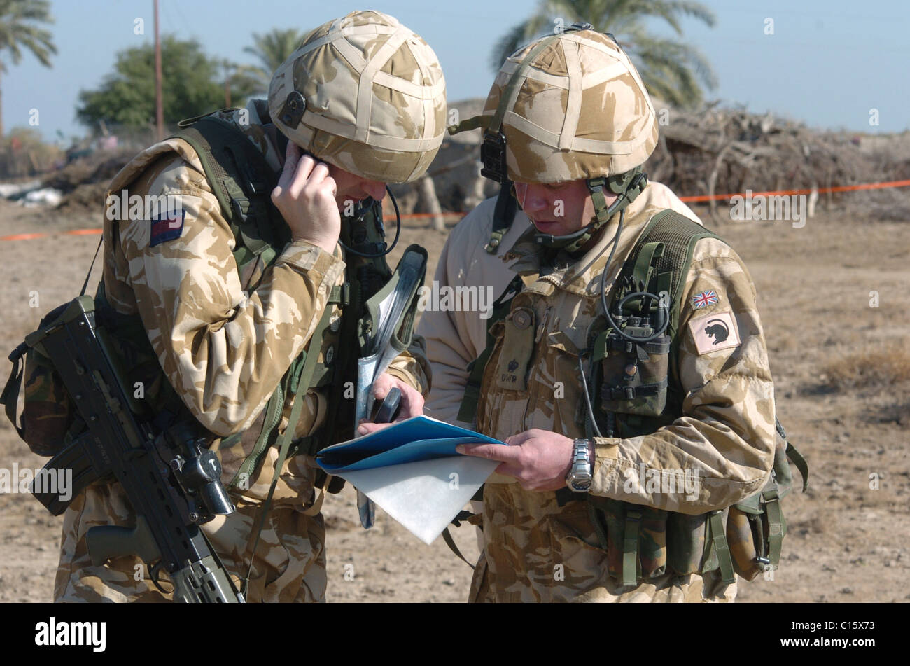 setting up a starlight radio in Iraq for communication Stock Photo - Alamy