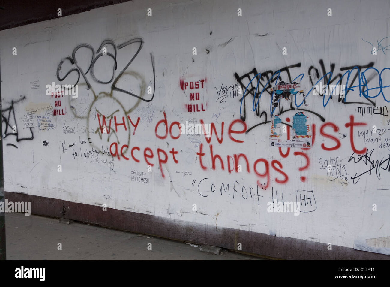 Wall full of graffiti and other social commentary, New York City Stock ...