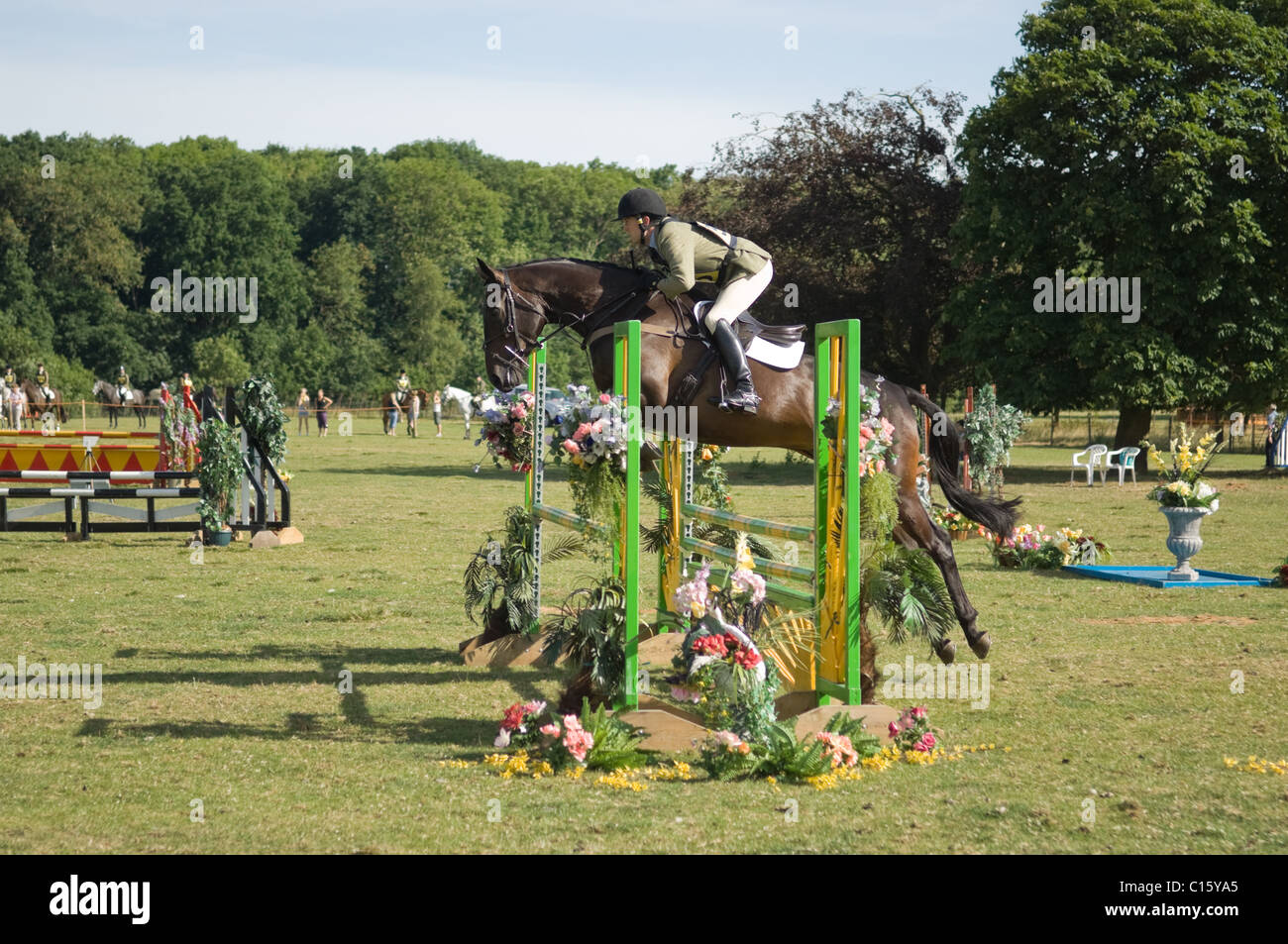 Horse & rider show jumping at Buckminster Horse Trials 2010 Stock Photo ...