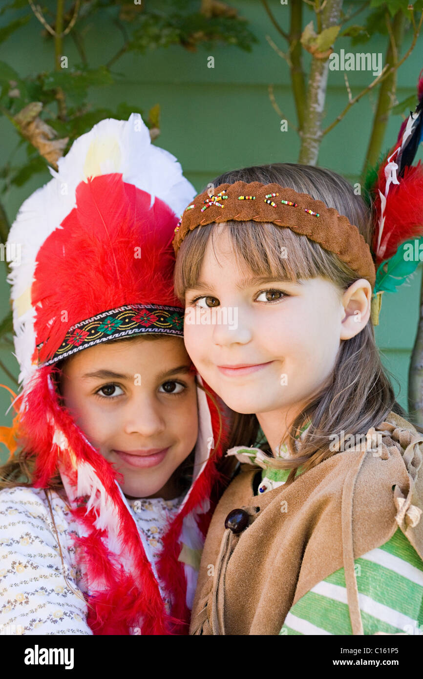 Two girls in Native American costumes Stock Photo - Alamy