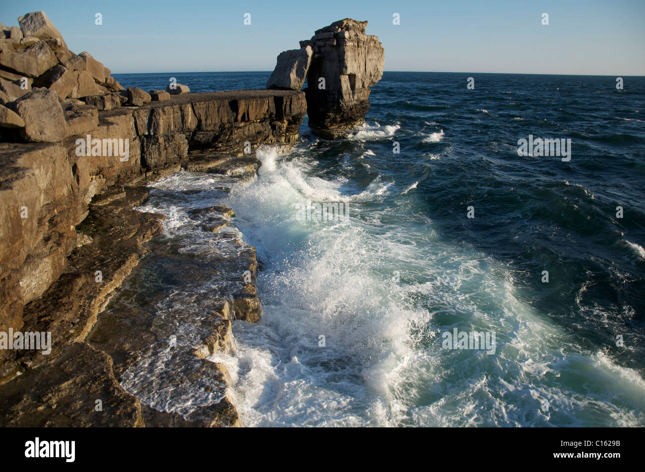 Pulpit Rock in a stormy sea. This massive limestone stack stands just ...