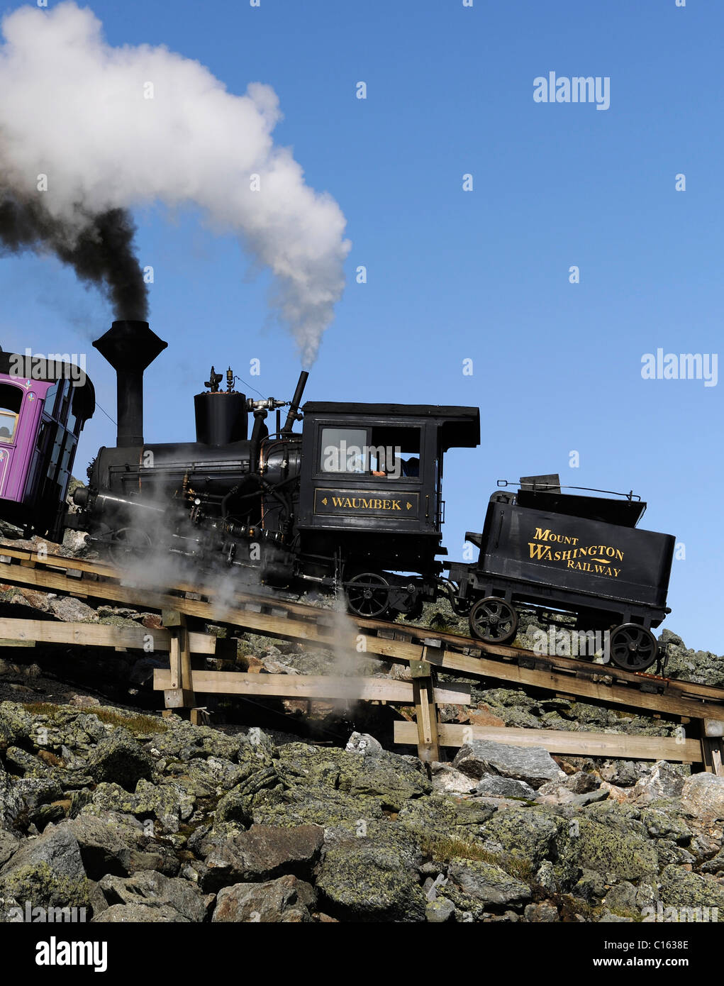 Mt. Washington Steam Train cog railway takes tourists up to observatory ...