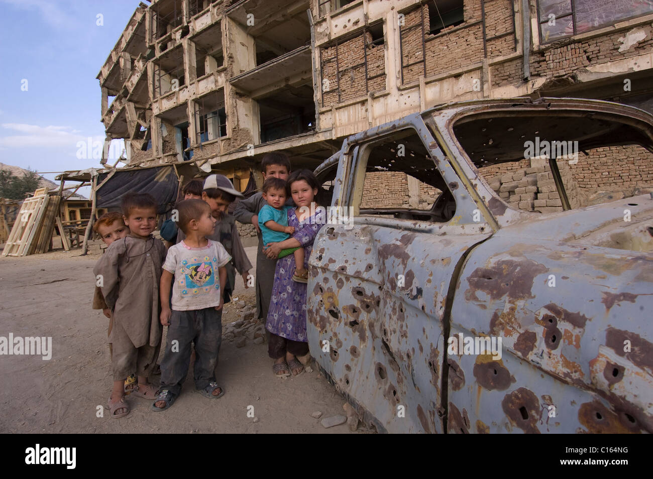 Children play in war torn Kabul Stock Photo - Alamy