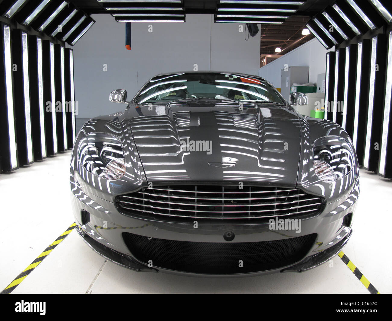 Luxury sports car inspected in a factory in a lightbox Stock Photo - Alamy
