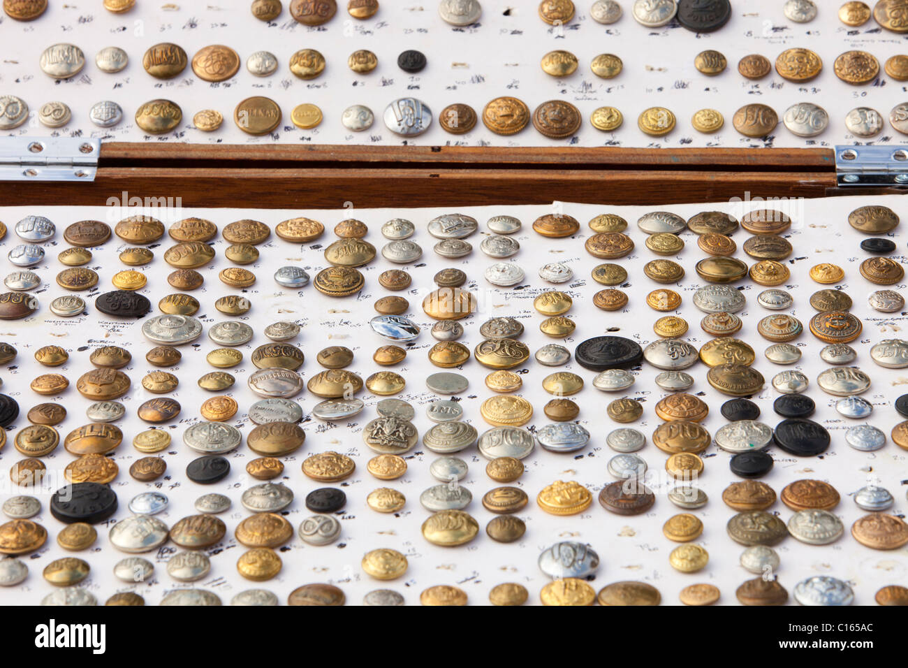 A collection of railway uniform buttons at a railway enthusiasts sale ...