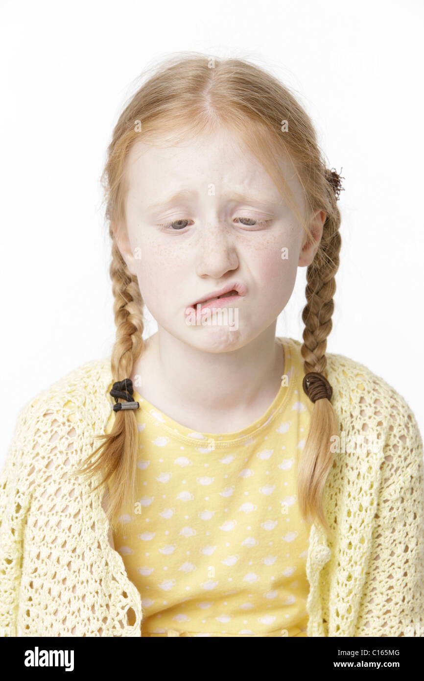 Girl, 8 years old, with braided hair, making a face Stock Photo - Alamy