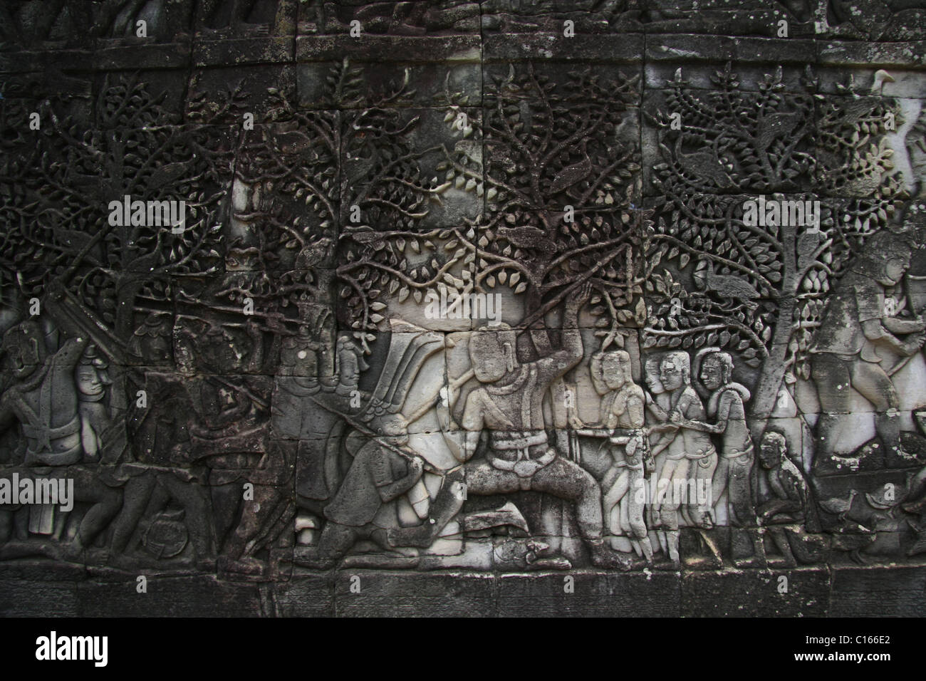 Bas-relief in the outer gallery of the Bayon, a temple located inside ...