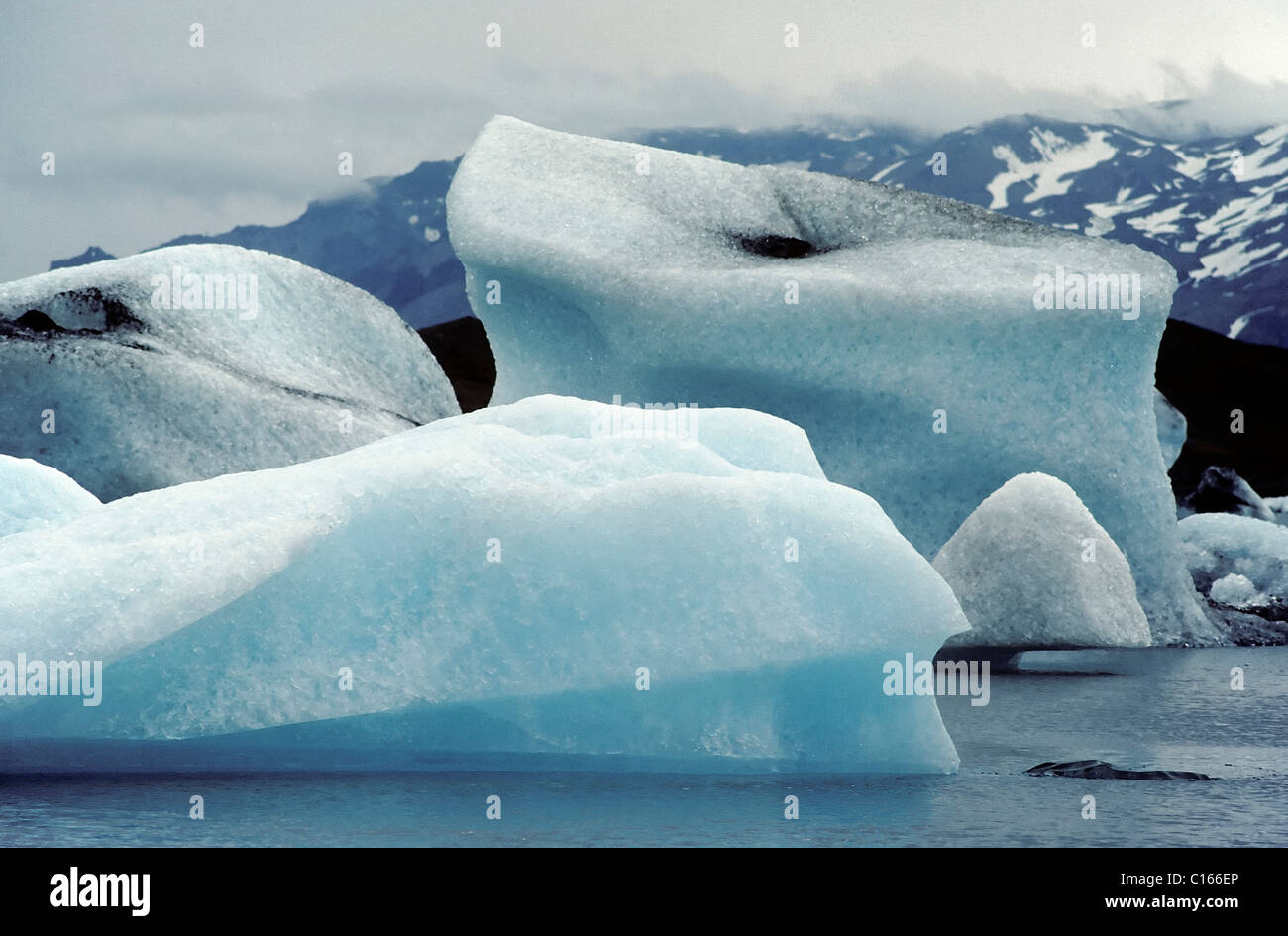 Bizarrely shaped, turquoise-coloured icebergs on a glacial lake ...