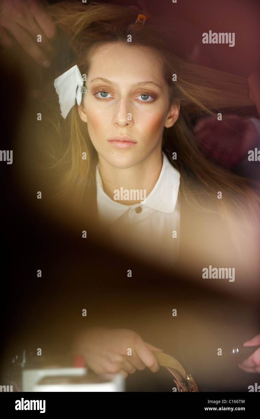 Models are styled backstage before the Matthew Williamson autumn 2011 ...