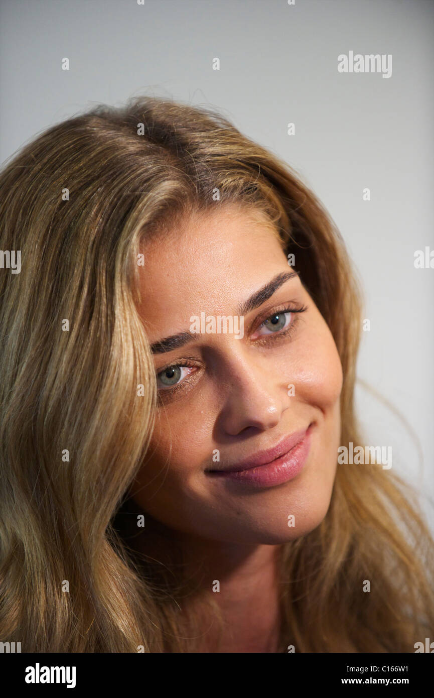 Model Ana Beatriz Barros poses for a photograph backstage before the ...