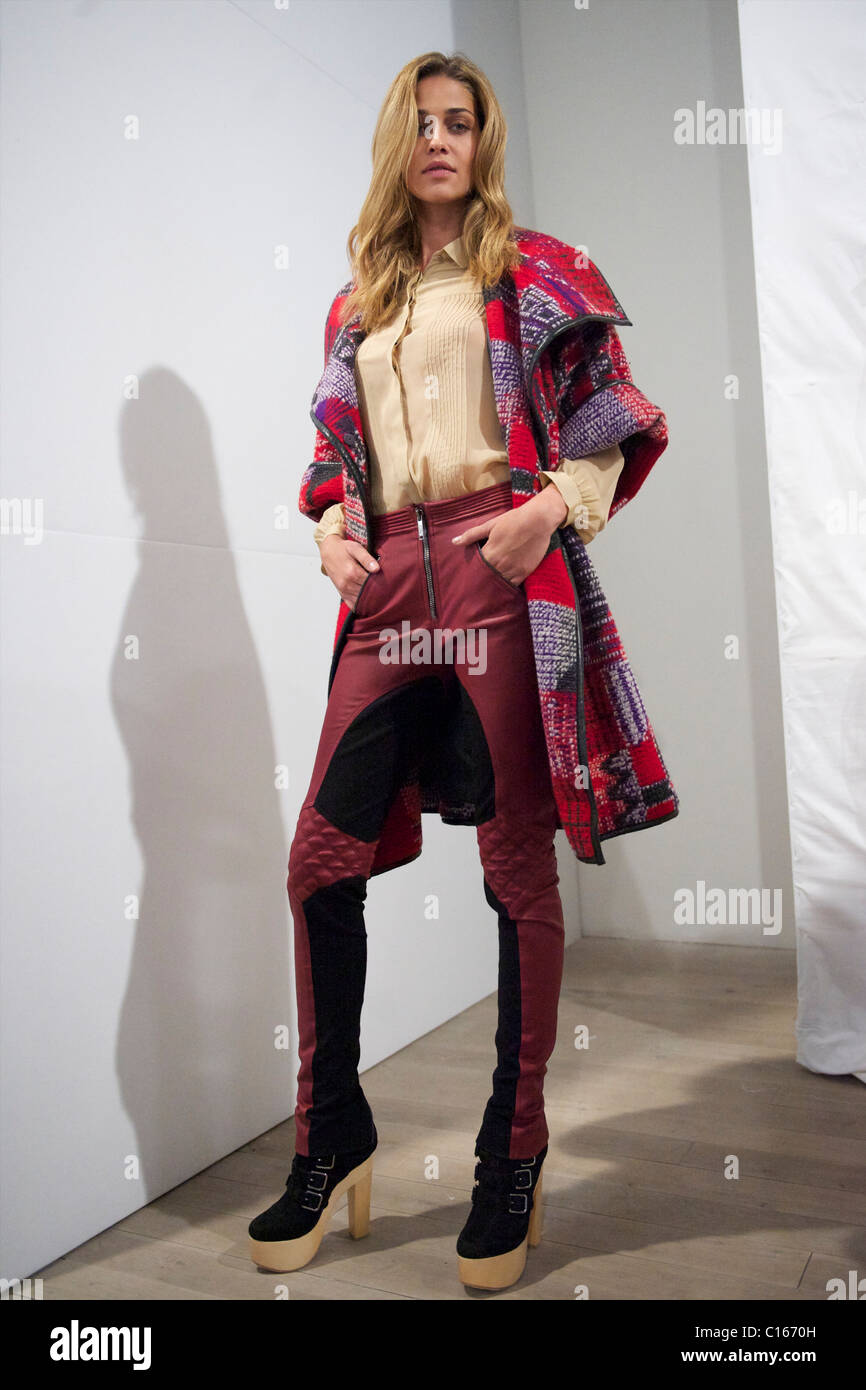 Model Ana Beatriz Barros poses for a photograph backstage before the ...