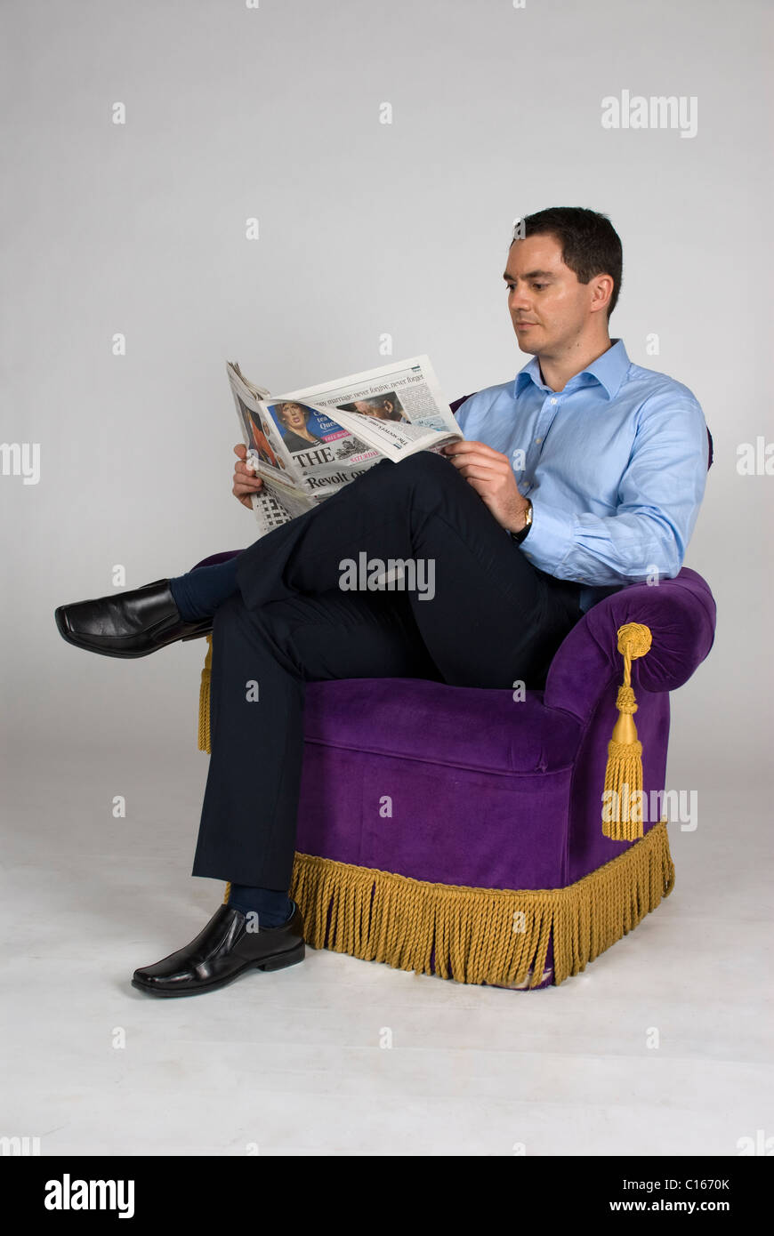 Man Reading Newspaper Stock Photo - Alamy