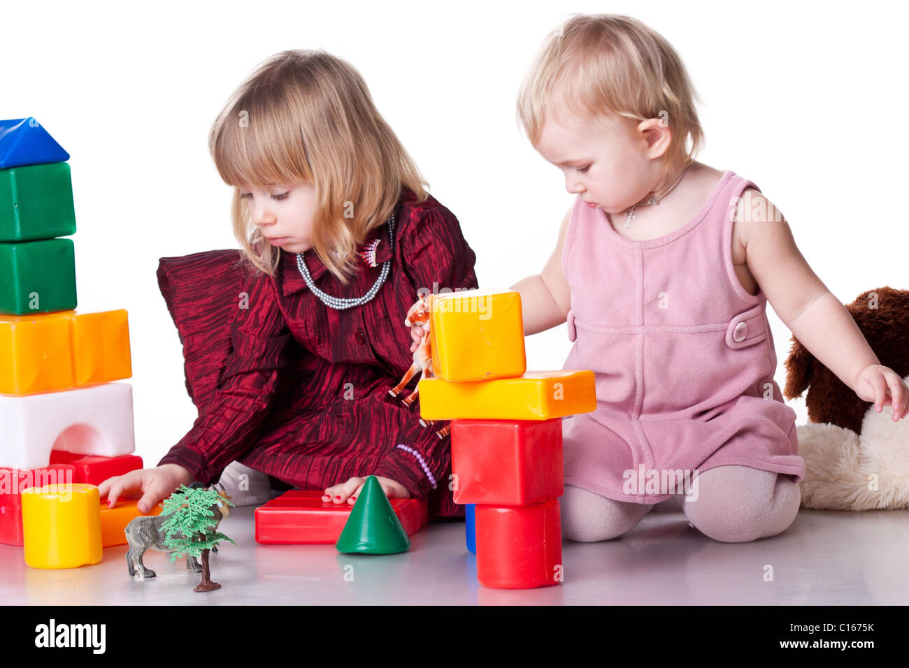 Children playing with blocks isolated on white Stock Photo - Alamy