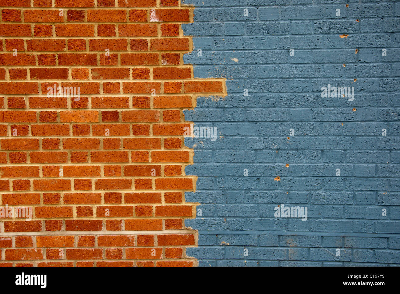 Detail of wall and Brick work new red brickwork joining blue painted ...