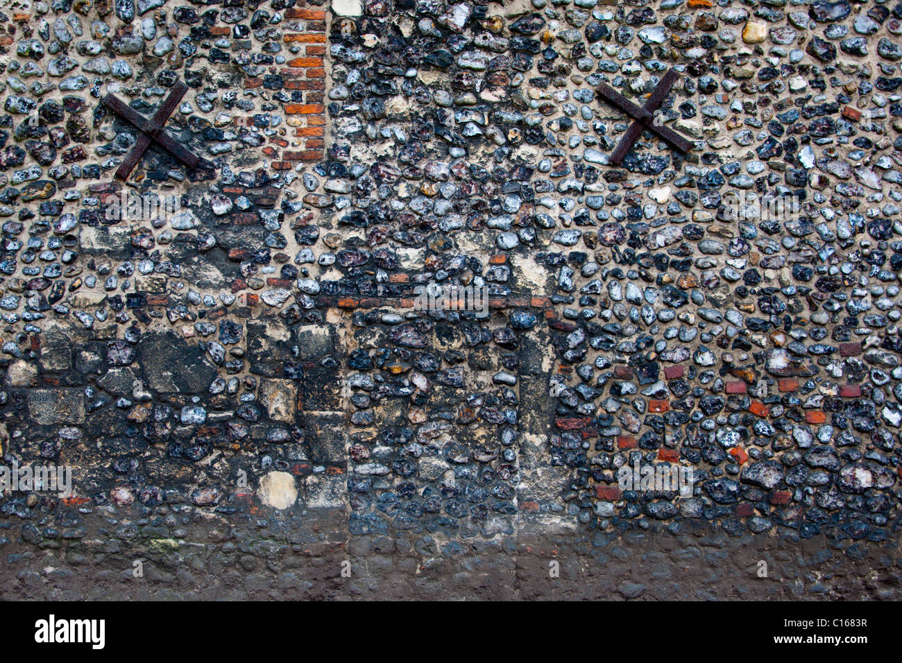 Detail of old wall and Brick work with flint and iron work Stock Photo ...