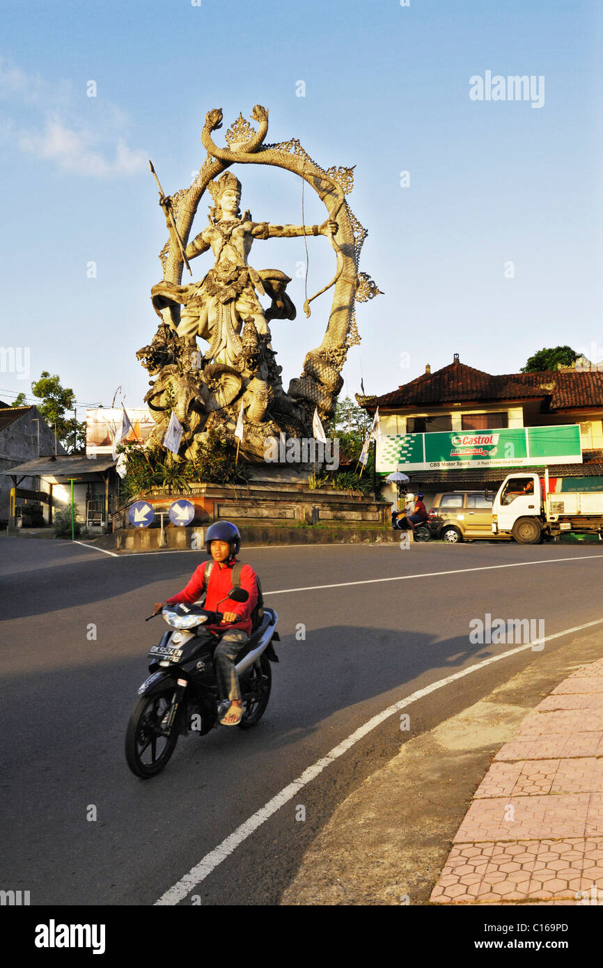 Statue at an intersection, Ubud, Bali, Indonesia Stock Photo - Alamy