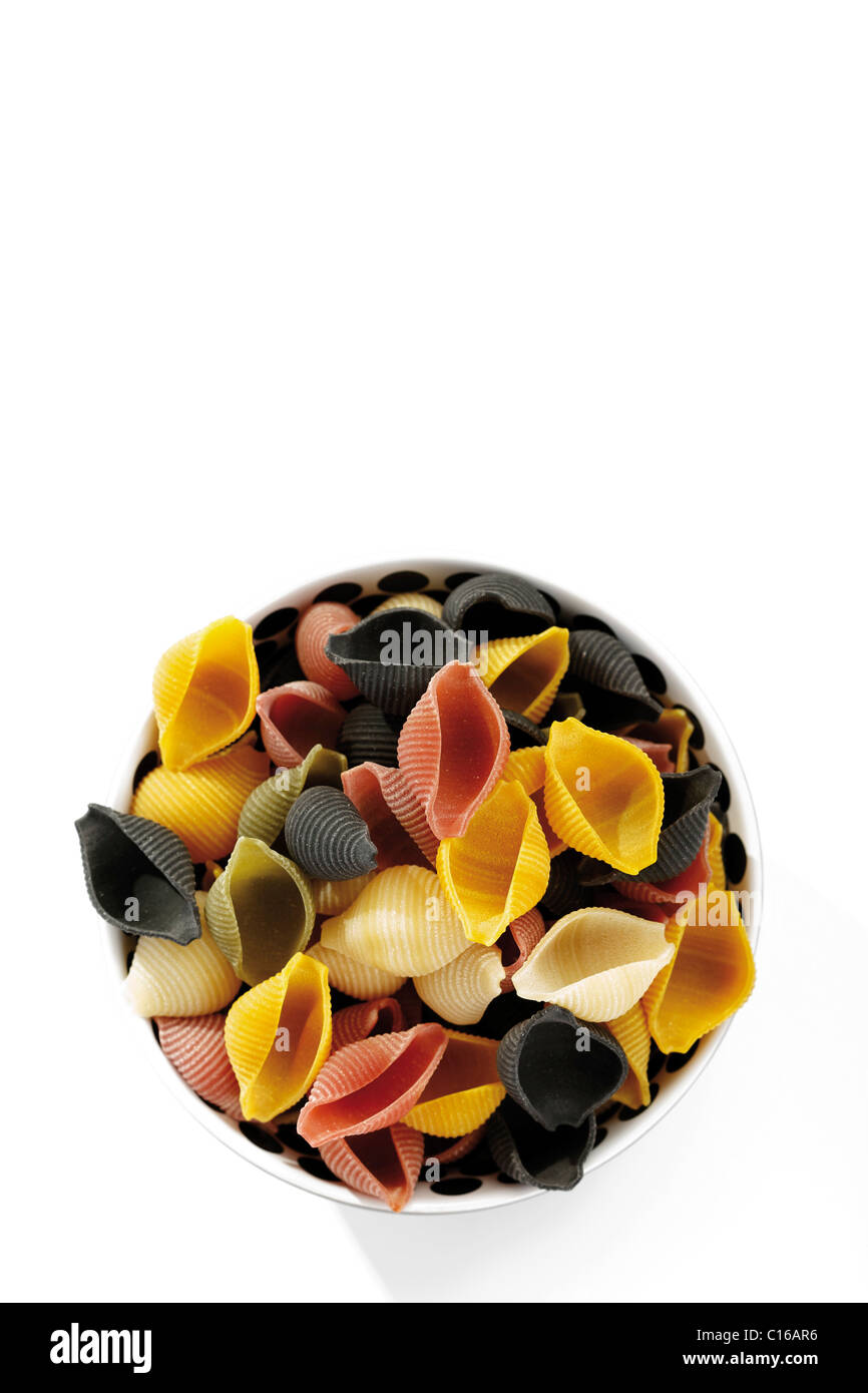 Coloured Conchiglie Rigata pasta in a bowl Stock Photo - Alamy