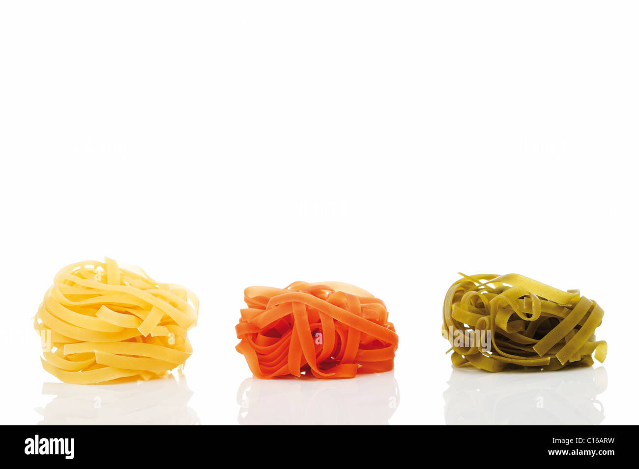 Coloured Tagliatelle nests Stock Photo - Alamy