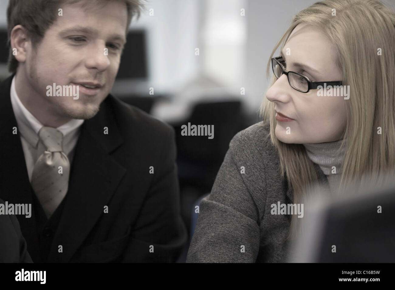 Working on a computer Stock Photo - Alamy