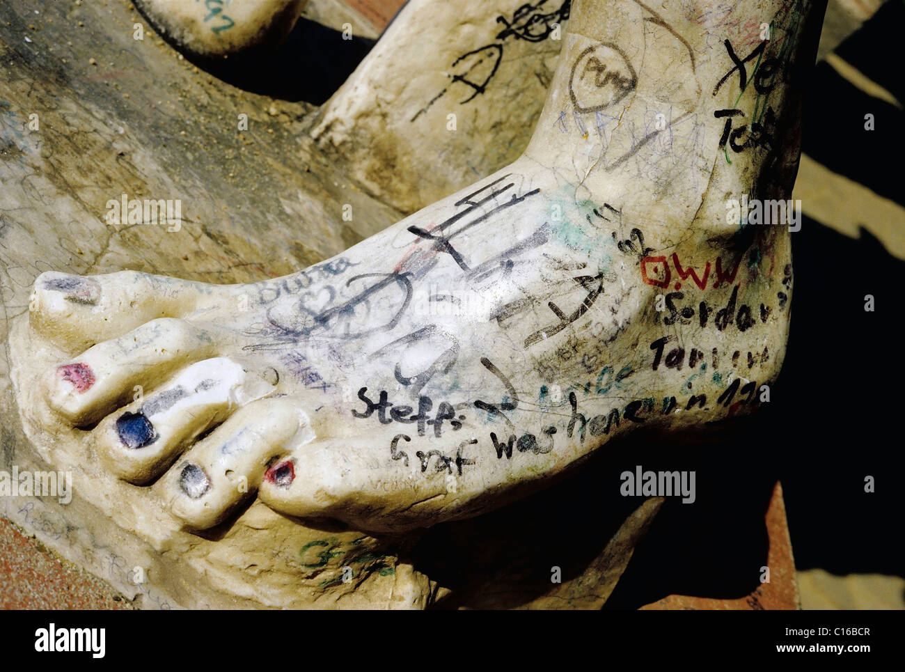 Foot of a roman statue, covered in the names of visitors, Xanten ...
