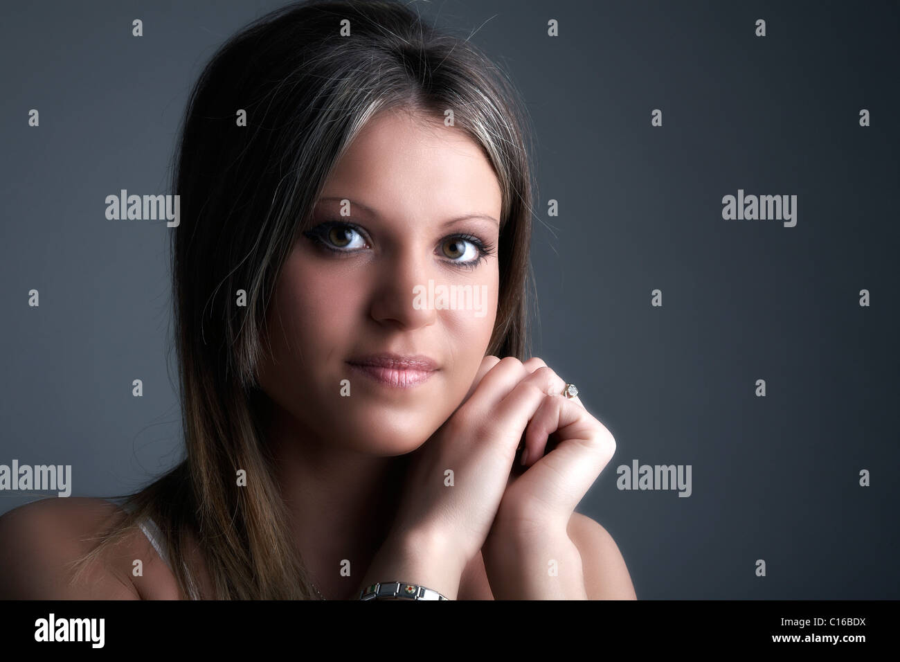 Young woman looking into of the camera Stock Photo - Alamy