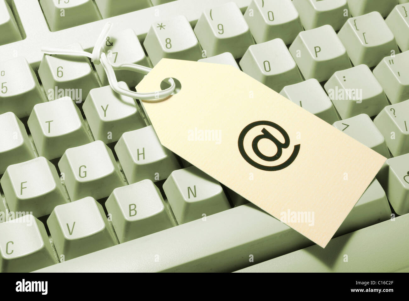 Computer keyboard with at sign tag Stock Photo - Alamy