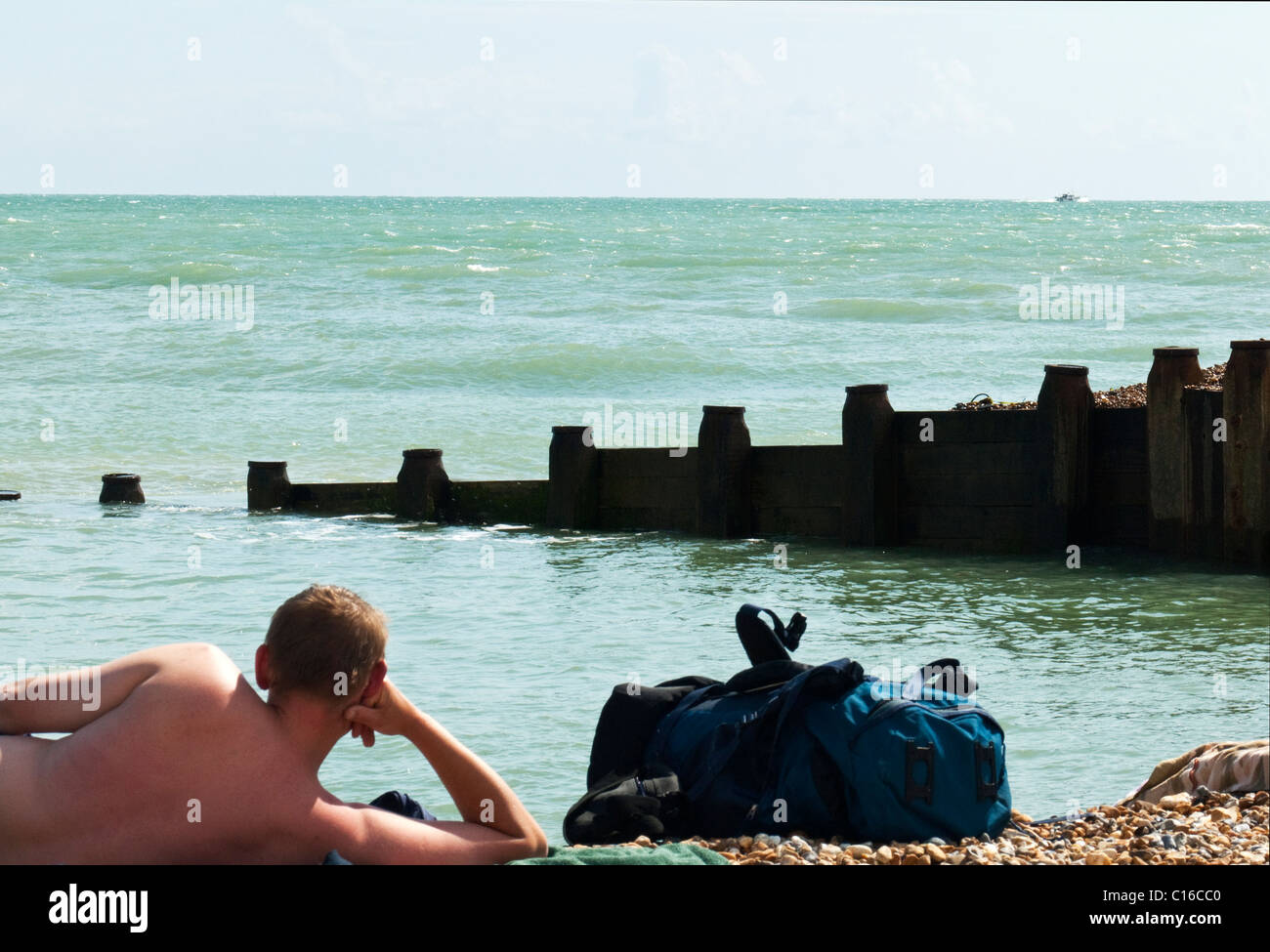 Sunburnt man beach hi-res stock photography and images - Alamy