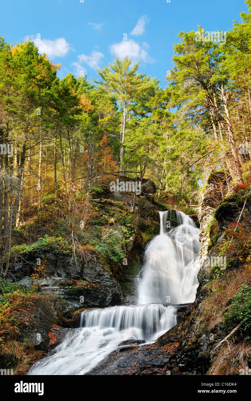 Waterfall in Autumn mountain with woods, foliage and rocks. From ...