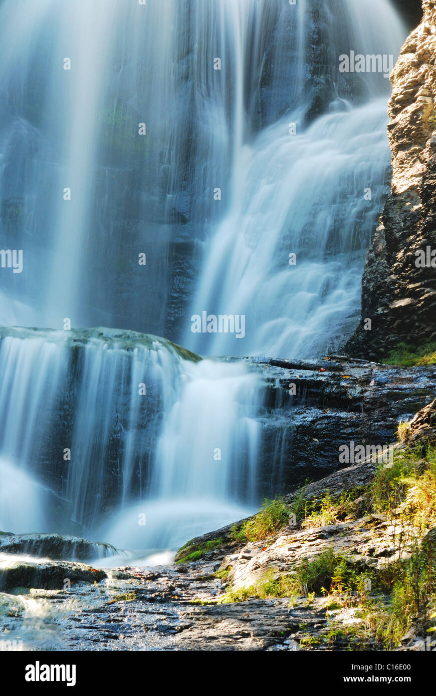 Waterfall in Autumn with rocks in mountain and woods. From Digman Falls ...