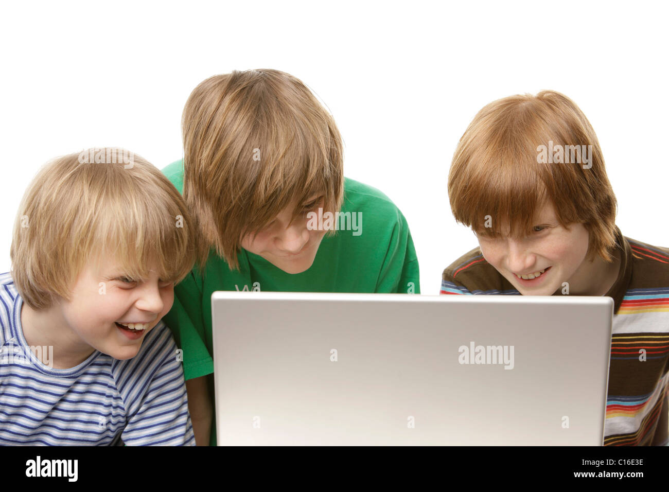 3 boys a laptop High Resolution Stock Photography and Images - Alamy